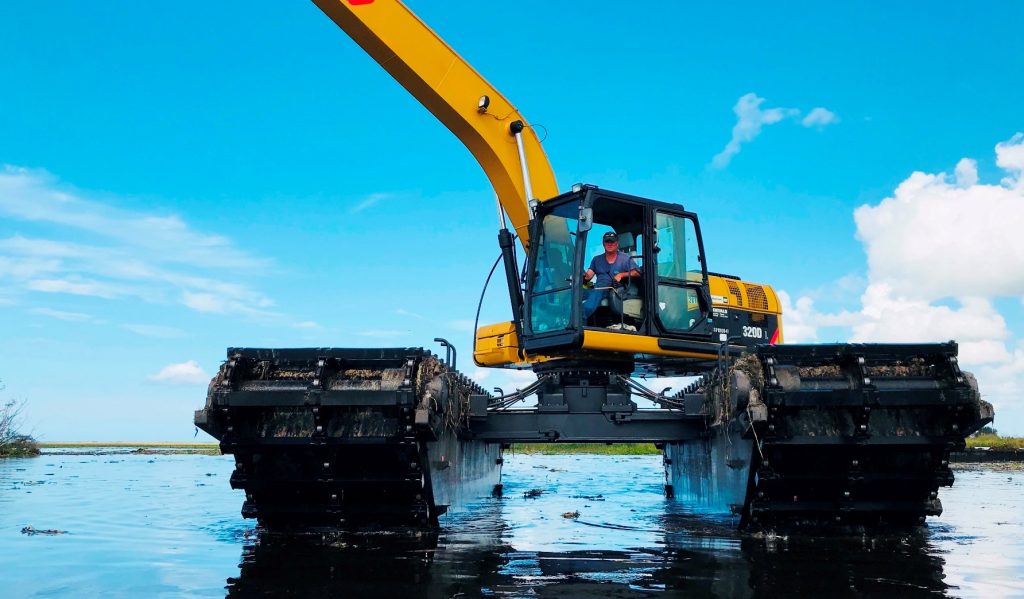 Wetland Management with an Amphibious Excavator – EIK Engineering Sdn Bhd