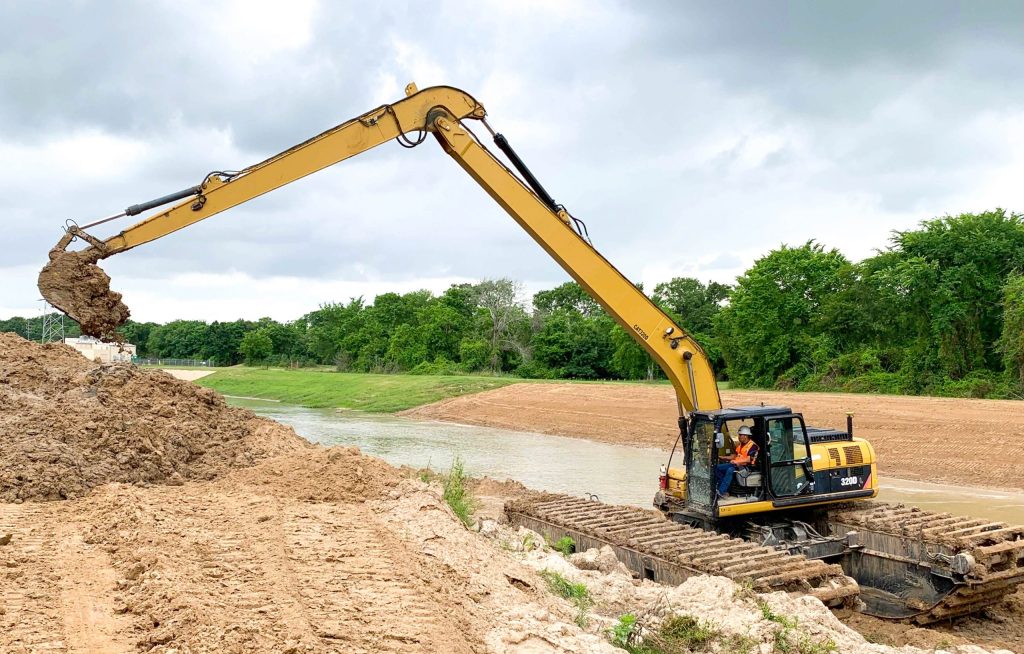 Flood Control with Amphibious Excavator – EIK Engineering Sdn Bhd