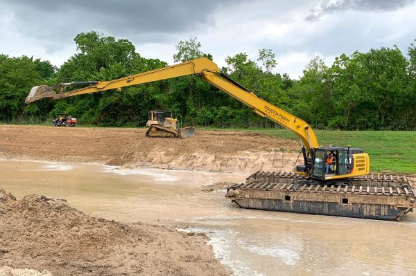 Flood Control with Amphibious Excavator – EIK Engineering Sdn Bhd