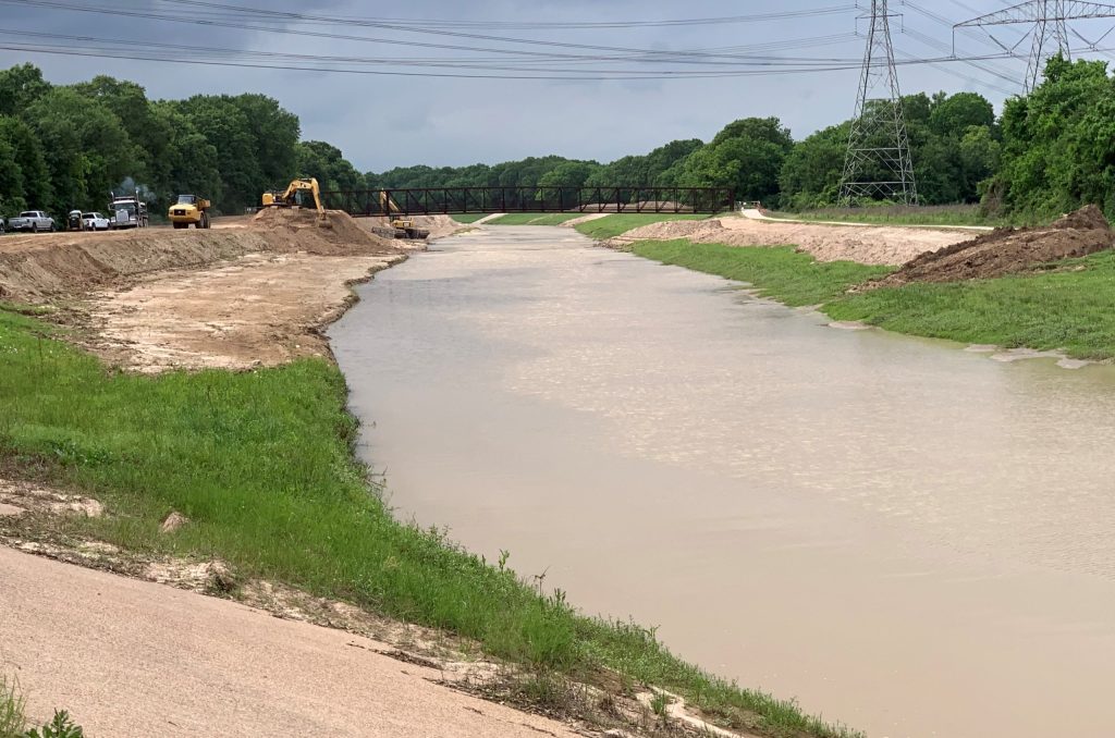 Flood Control with Amphibious Excavator – EIK Engineering Sdn Bhd